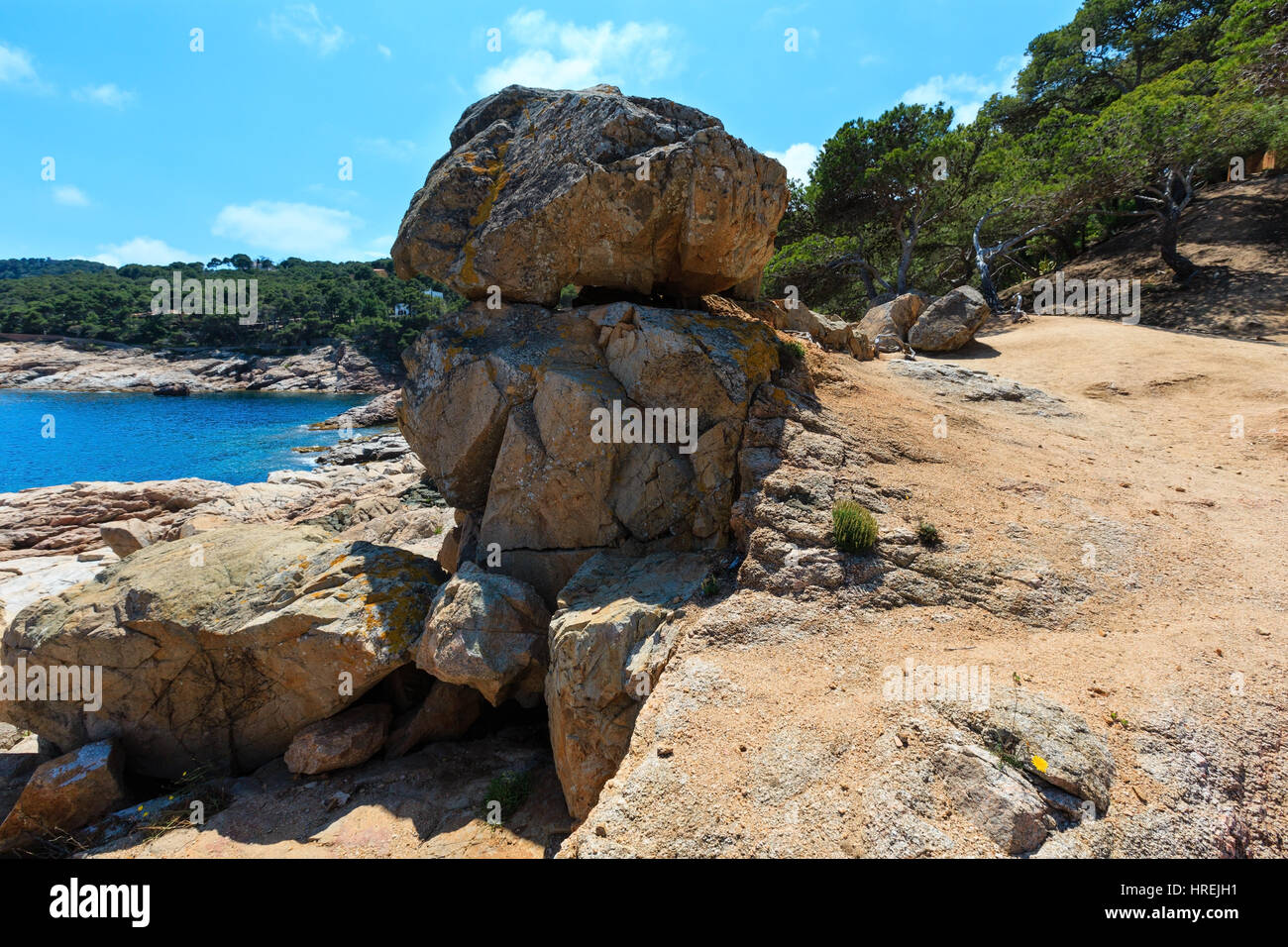 Big boulders on shore and Mediterranean sea rocky coastline summer view ...
