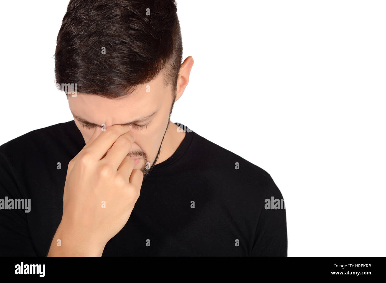 Portrait of a young sad man. Isolated white background Stock Photo - Alamy
