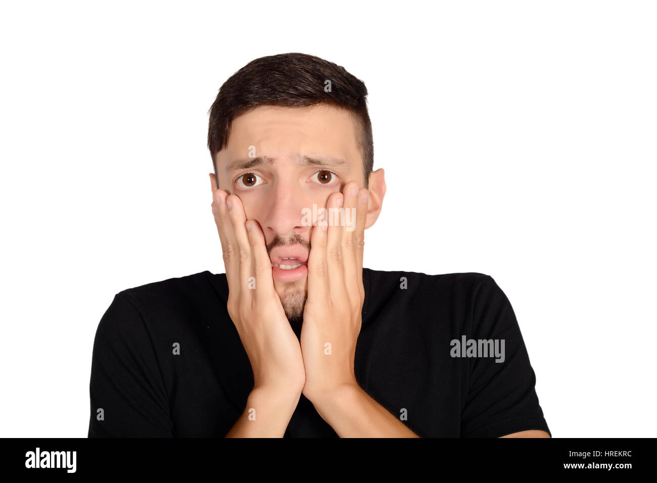 Portrait of a young man worried. Isolated white background Stock Photo ...