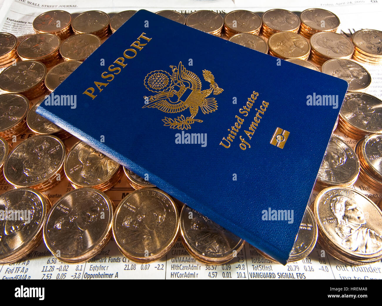US passport on stacks of dollar gold coins with native american ...