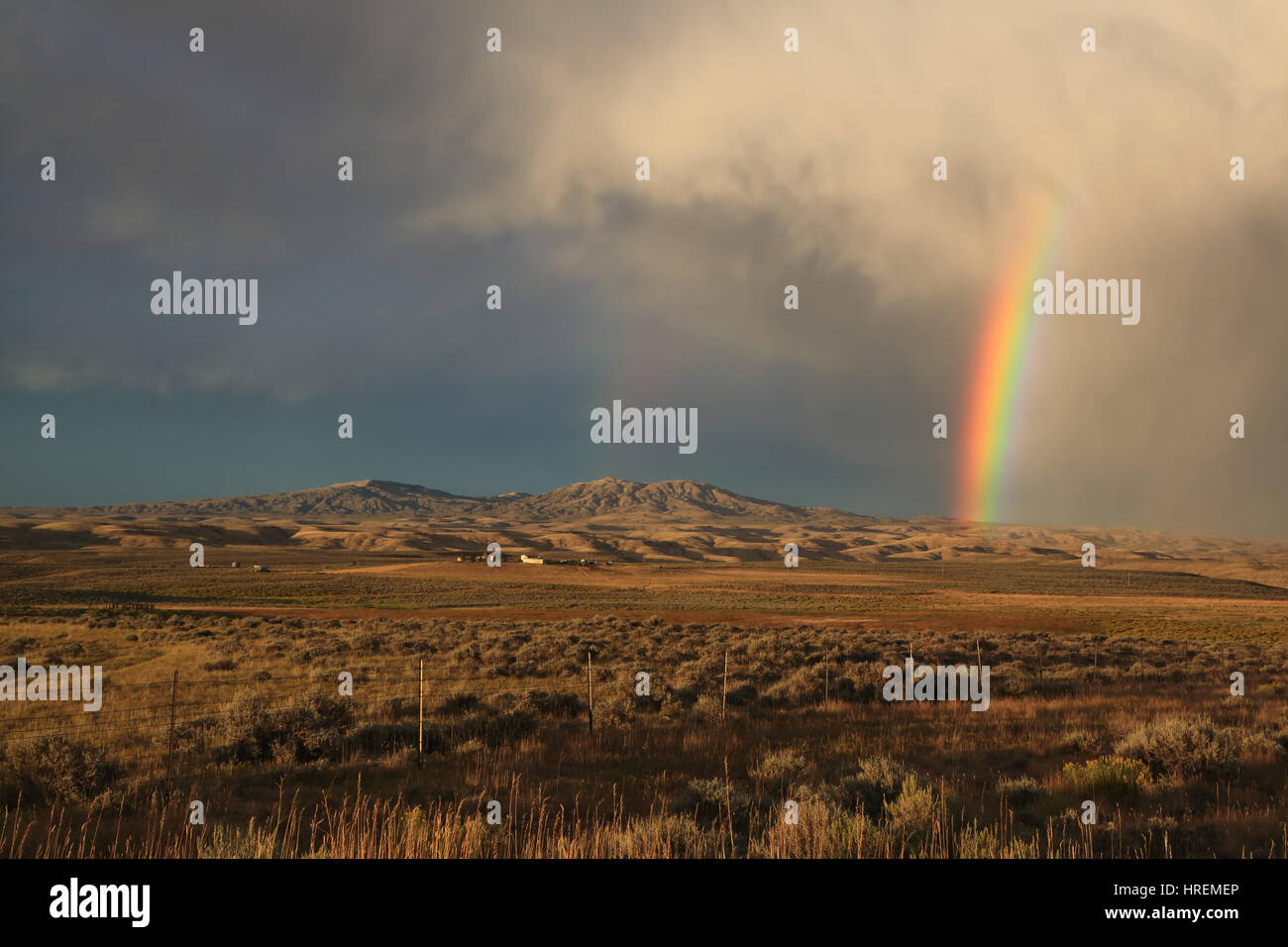 Rainbow reaching ground hi-res stock photography and images - Alamy