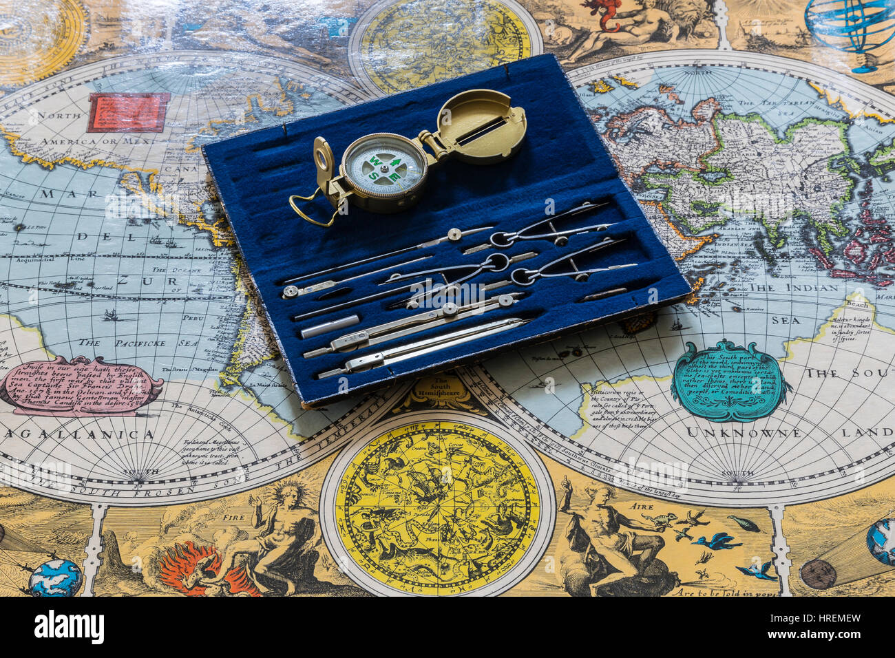 compass and antique drafting instruments on ancient world map Stock ...