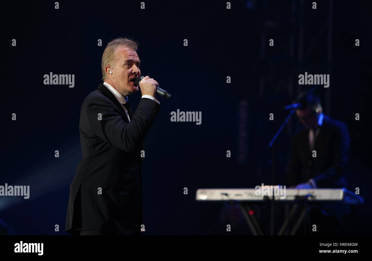 Martin Fry of ABC singing into a hand held microphone at the Isle of ...