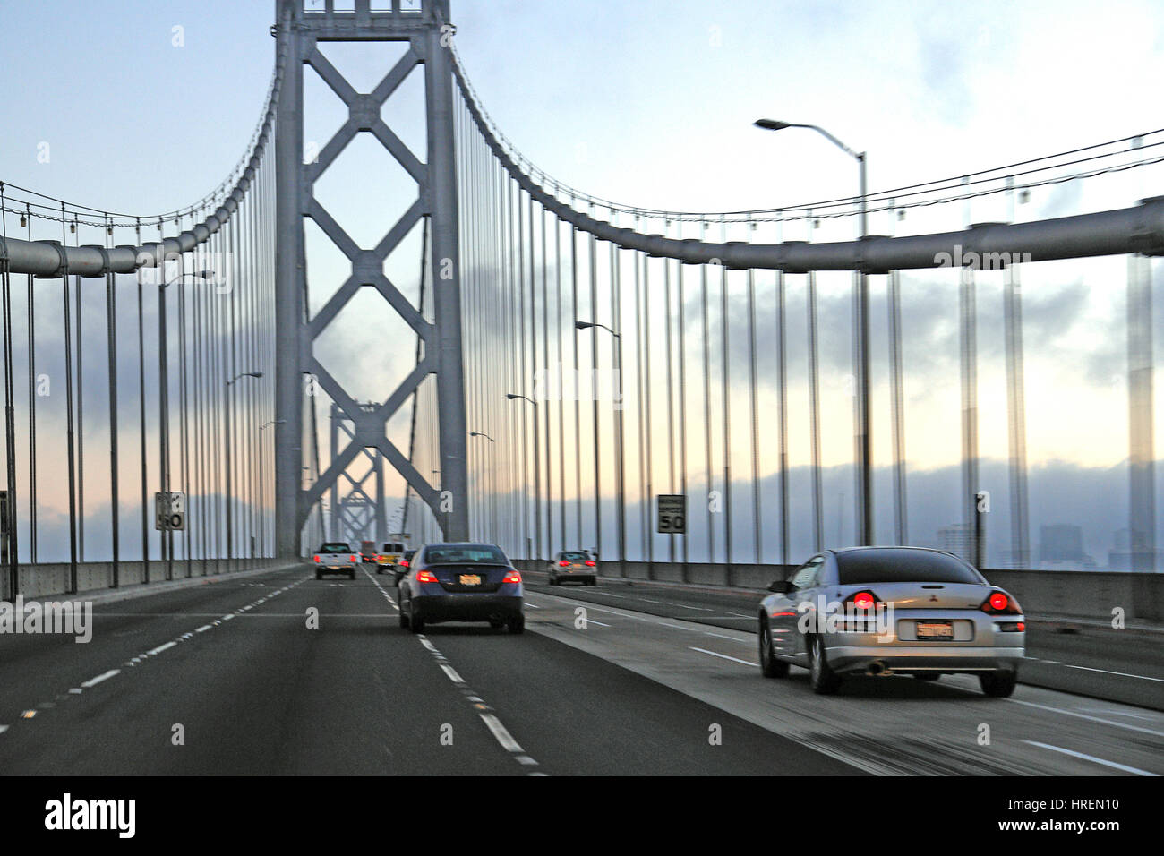 Cars on San Francisco Bay bridge at sunset Stock Photo - Alamy