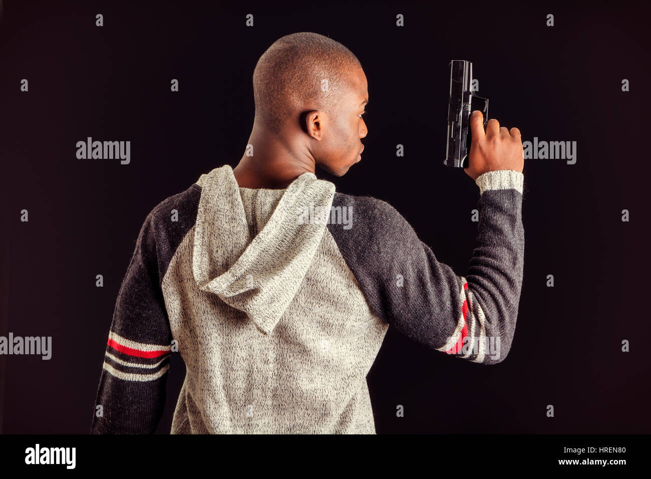 Black Hand Holding Gun
