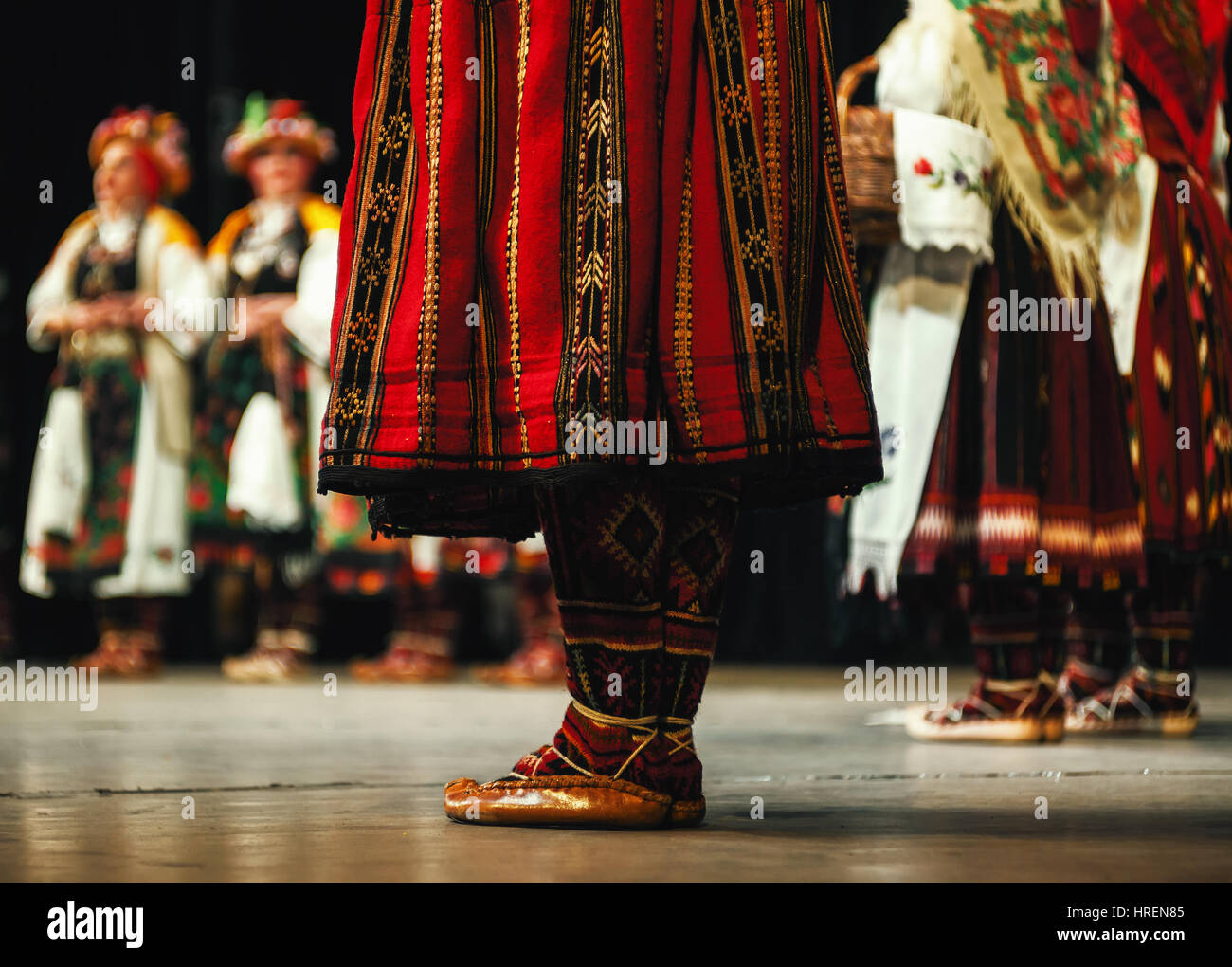Men and women in traditional dress dancing hi-res stock photography and ...