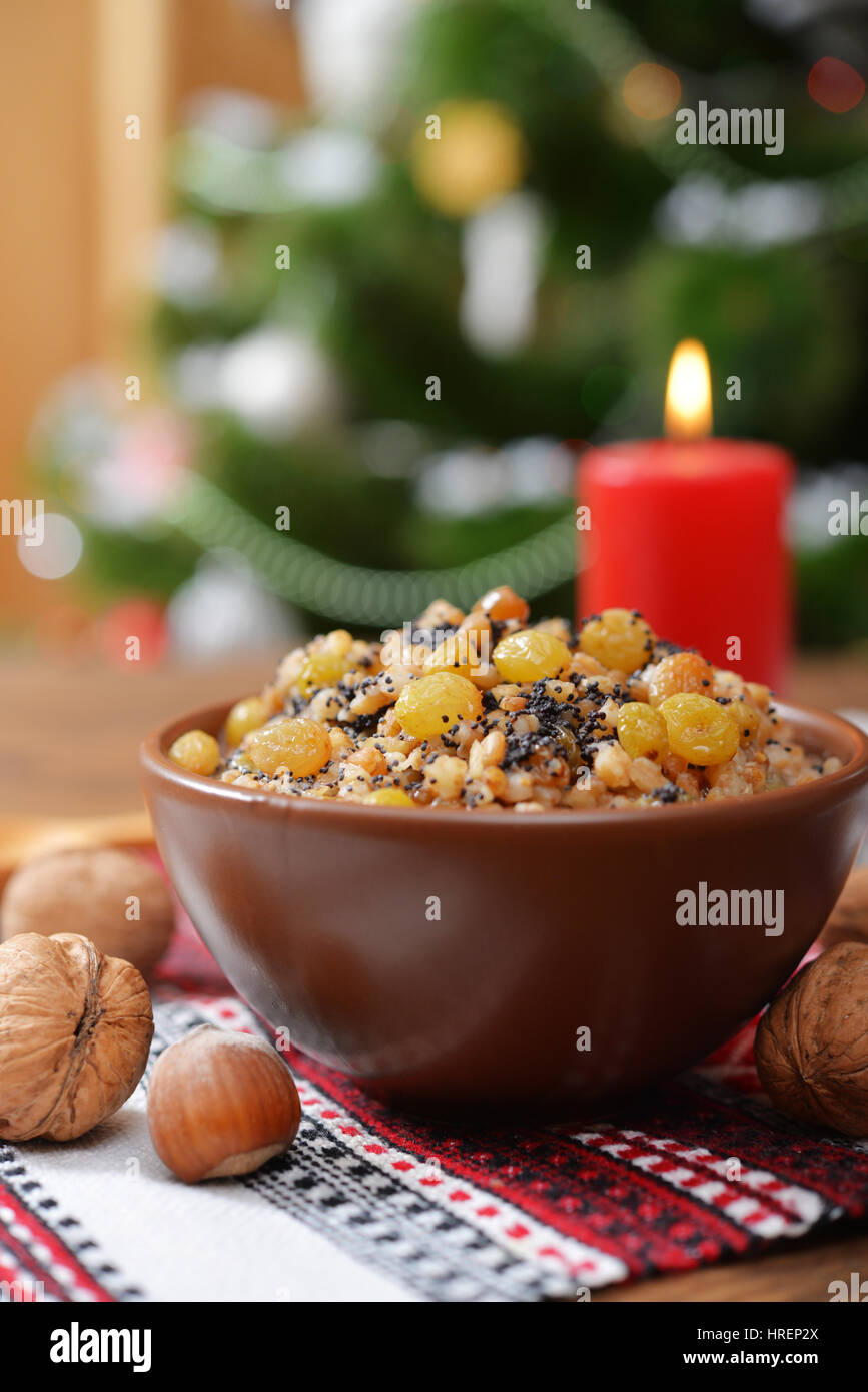 Traditional Christmas slavic dish kutia in ceramic bowl with fir tree ...
