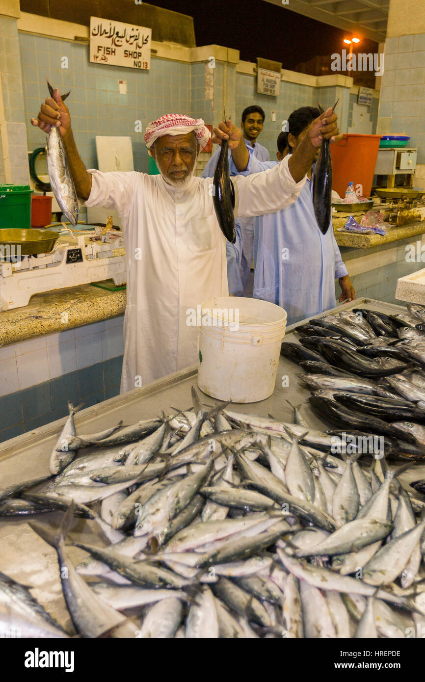 FUJAIRAH, UNITED ARAB EMIRATES - Vendor displays seafood at Fish Market ...
