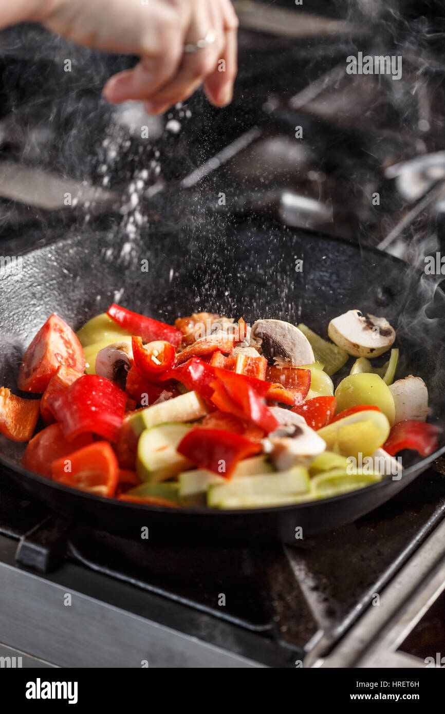 Chef preparing vegetarian food in restaurant kitchen Stock Photo - Alamy
