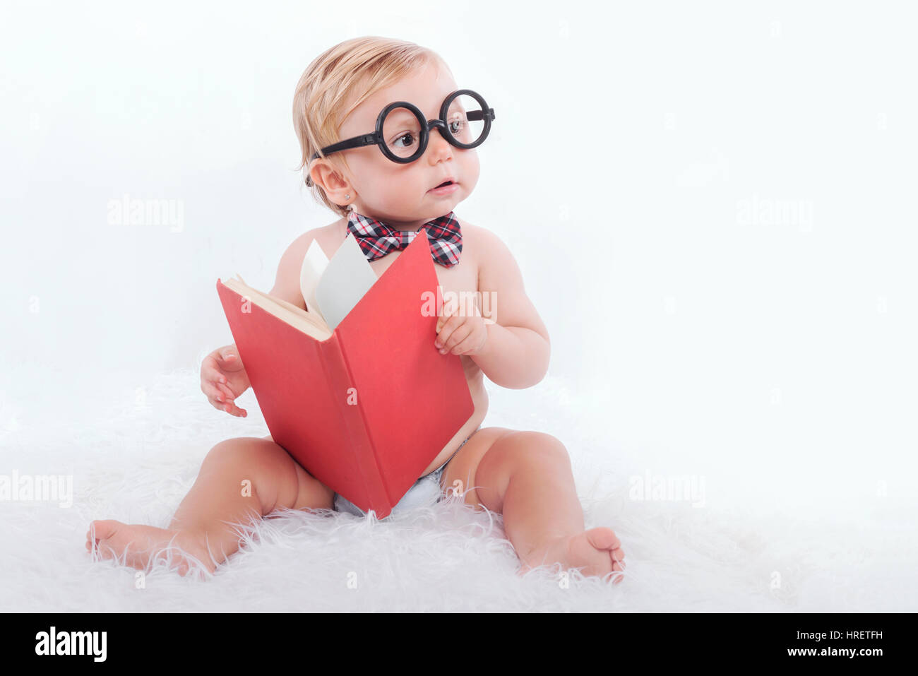 Baby Reading With Glasses