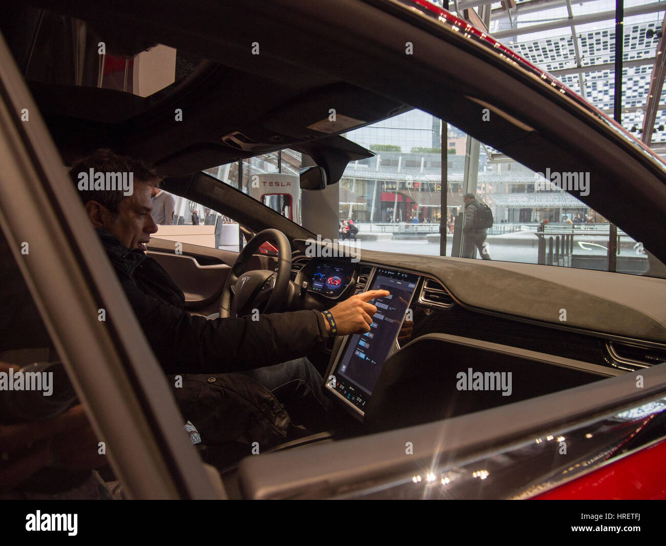Tesla showroom , Milan Italy Stock Photo - Alamy