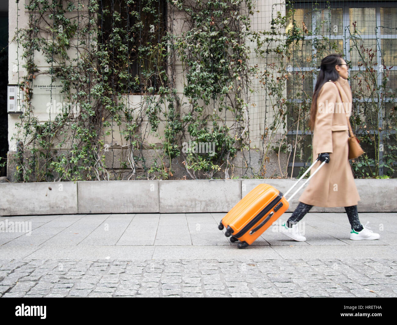 commuters and tourist in Milan during Milano Fashion Week Feb 2017 ...