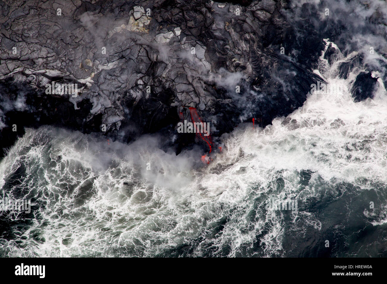 Lava flowing into the ocean hi-res stock photography and images - Alamy