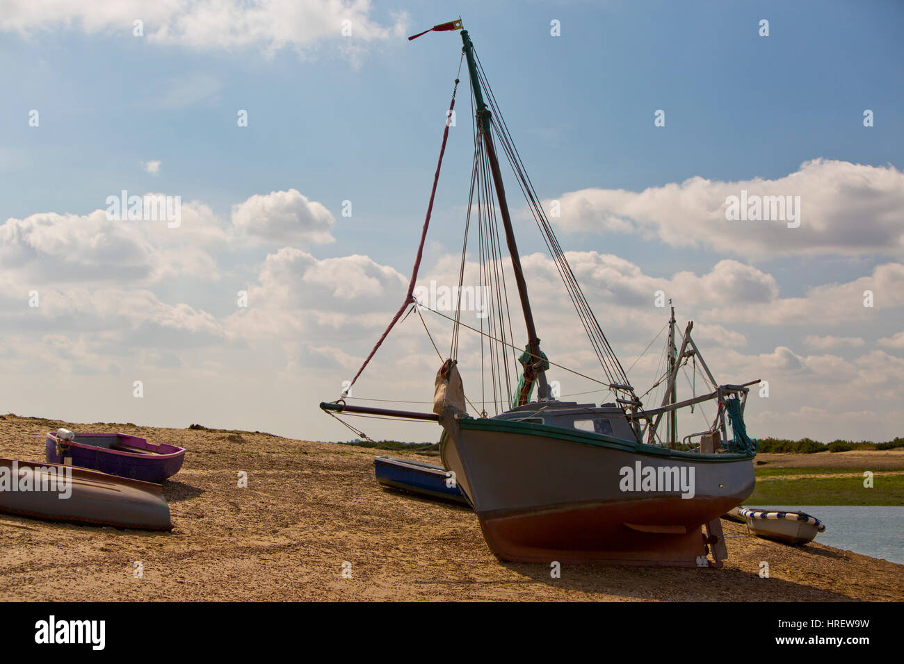 A beached sailing boat or yacht Stock Photo - Alamy