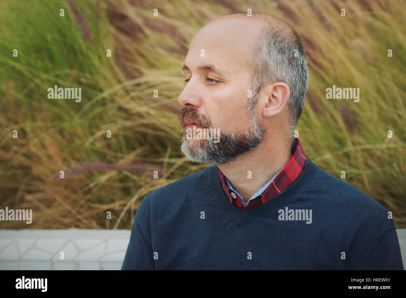 Man thinking outdoors Stock Photo - Alamy