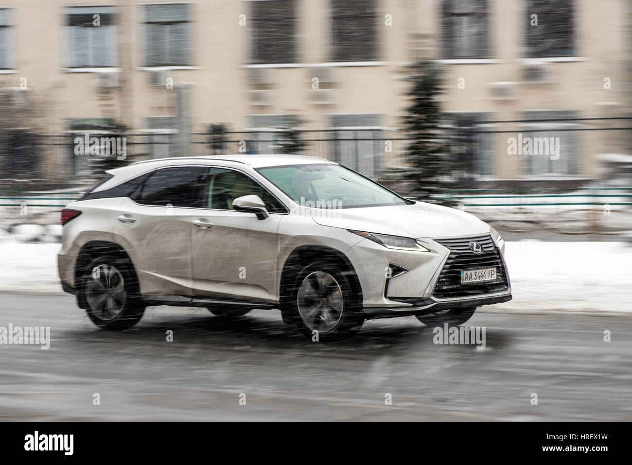 Kyiv, Ukraine - December 4th, 2016: White Lexus RX car in motion with ...