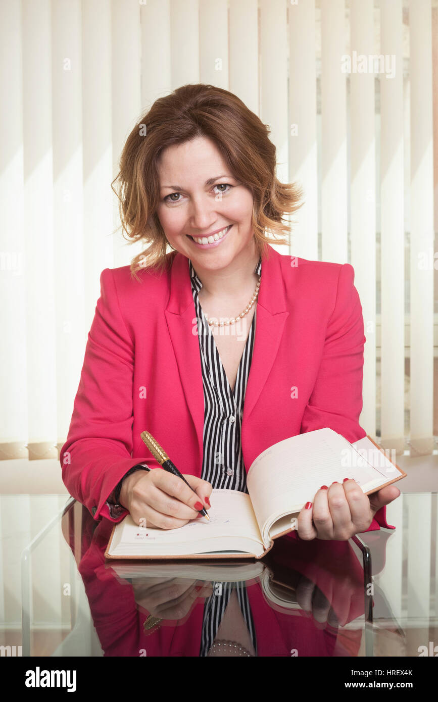 Businesswoman. Beautiful successful smiling woman Stock Photo - Alamy