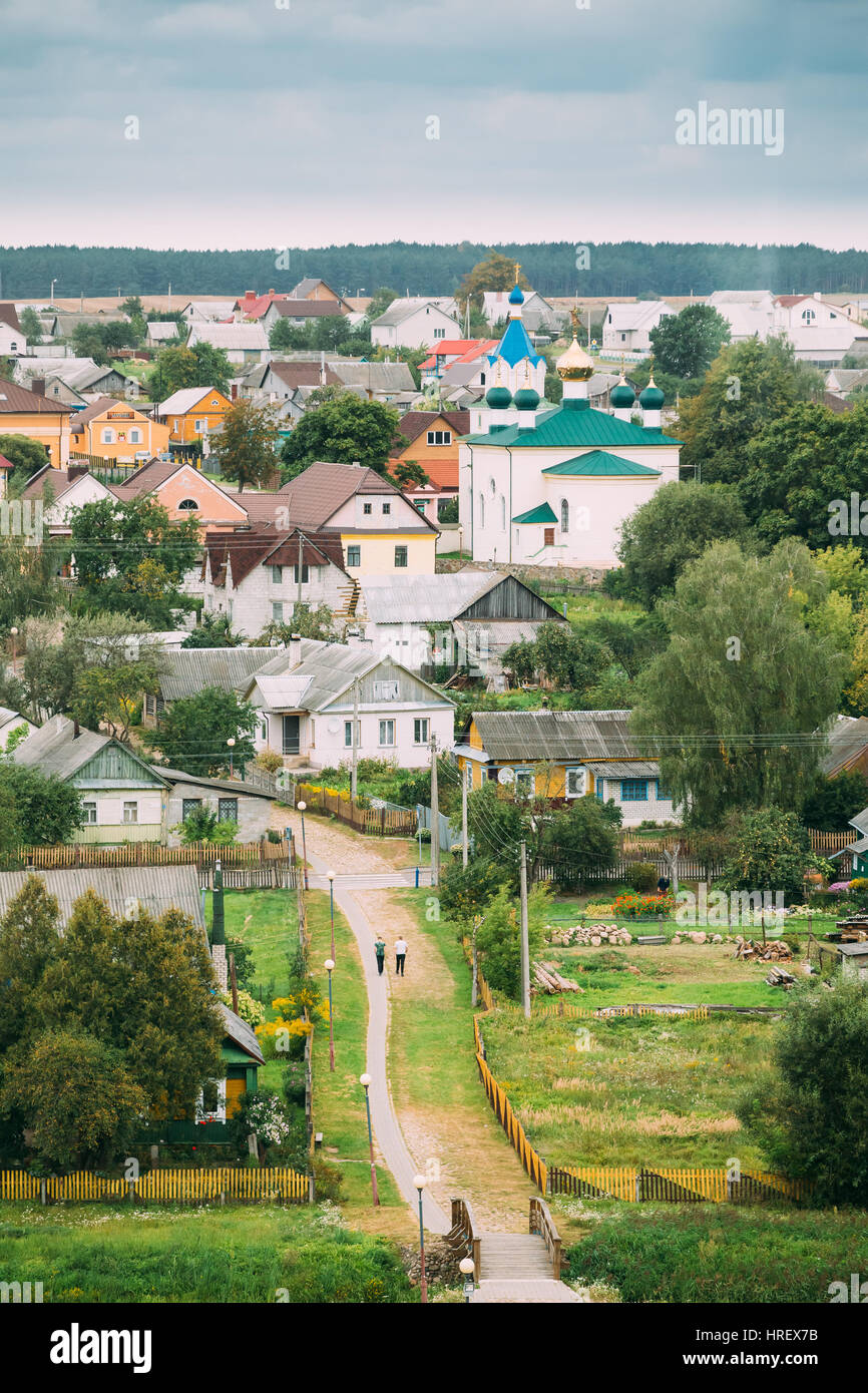 Mir, Belarus. Landscape Of Village Houses And Orthodox Church Of The ...