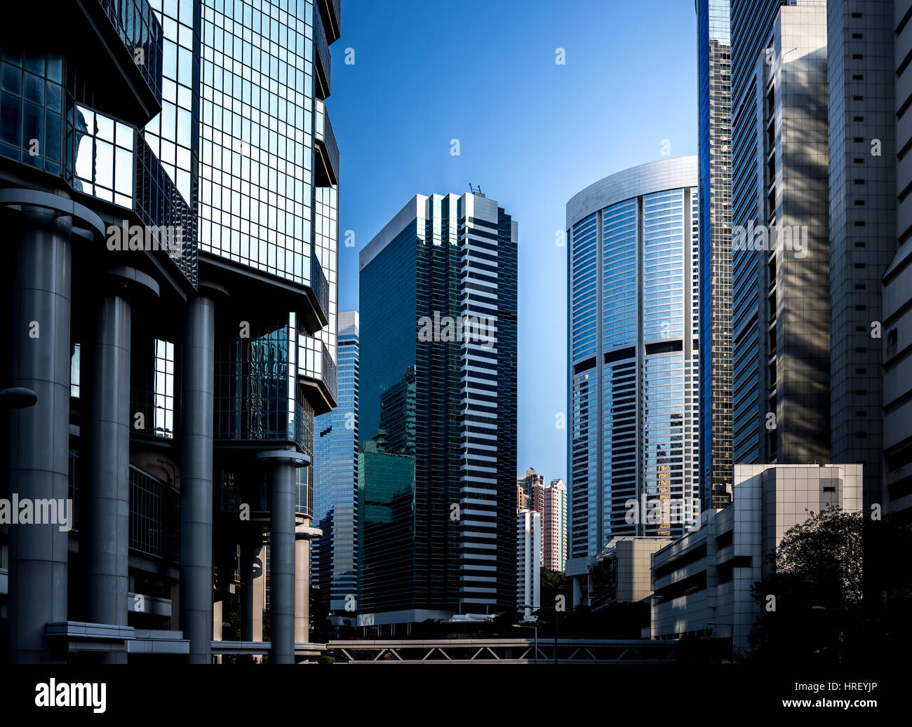 Modern office building close up in sunlight Stock Photo - Alamy