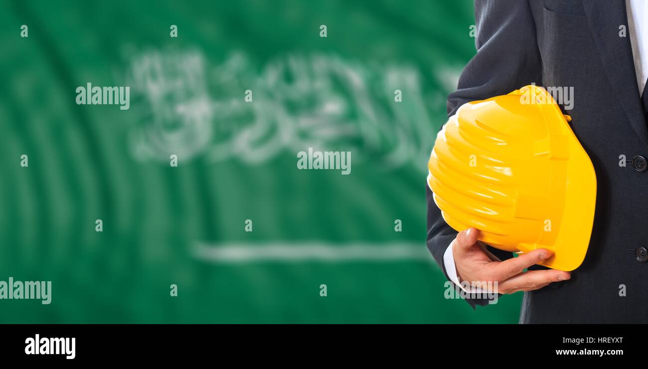 Engineer on a waiving Saudi Arabia flag background. 3d illustration ...