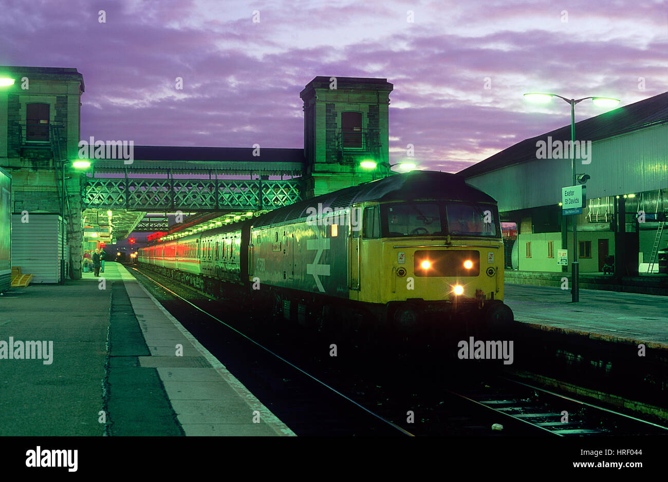 A large loco class 47 pauses at Exeter St Davids railway station while ...