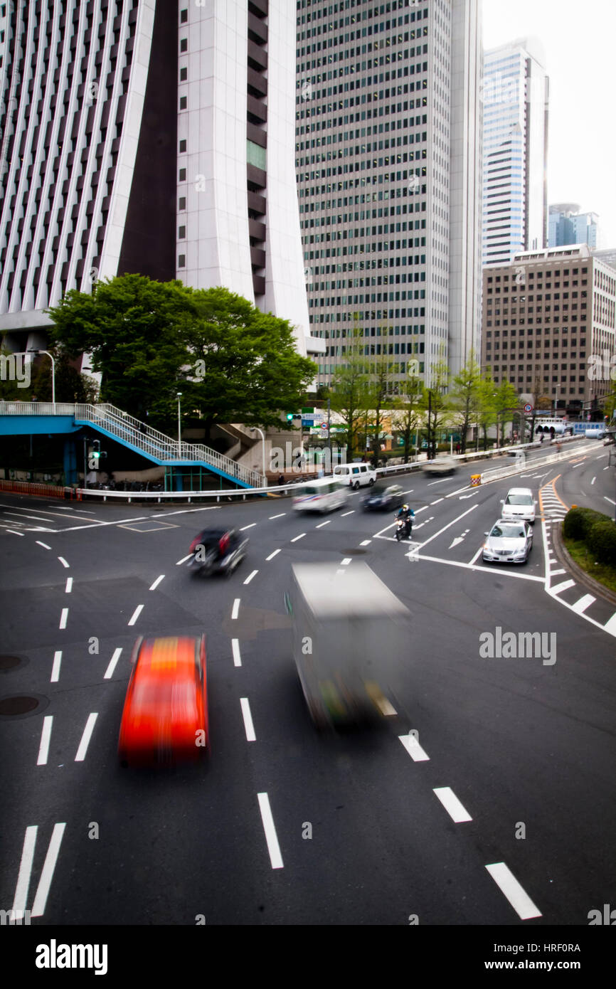 A tree reflected in an office block window in Tokyo, Japan Stock Photo ...