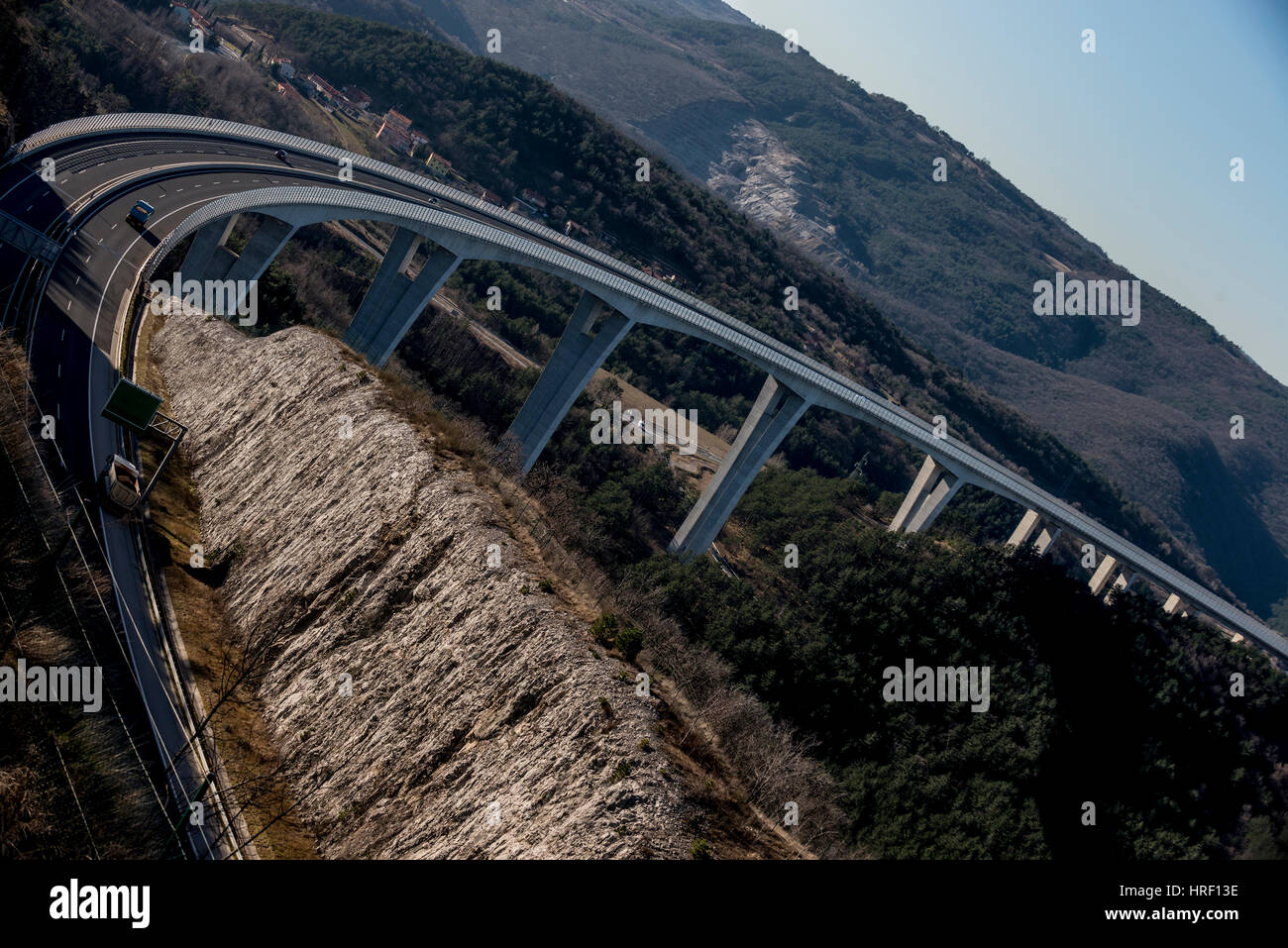 Tall highway road bridge with driving vehicles on it Stock Photo - Alamy