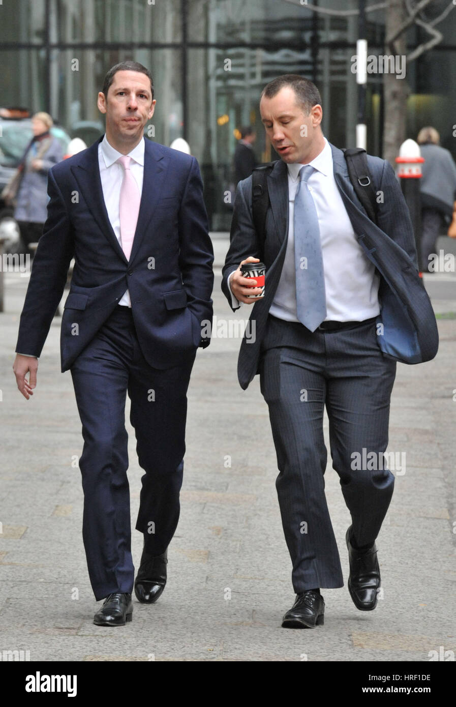 Christian Candy (left), with an unidentifed man, outside the Rolls ...