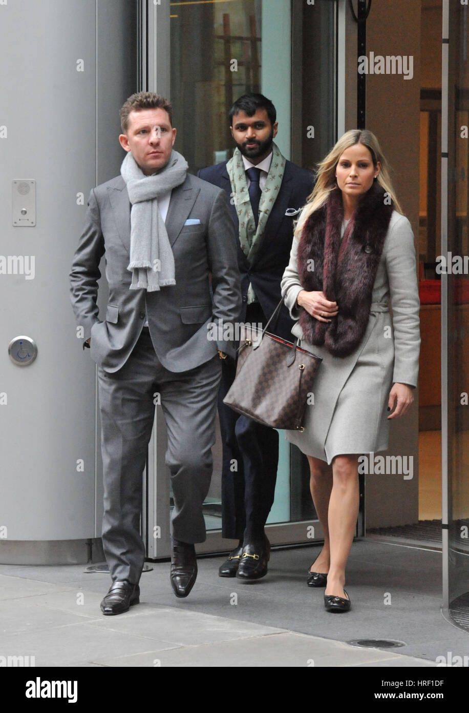Nick Candy (left), with unidentified people, outside the Rolls Building ...