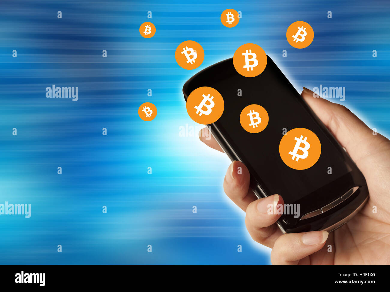 making a payment with bitcoin cryptocurrency Stock Photo - Alamy