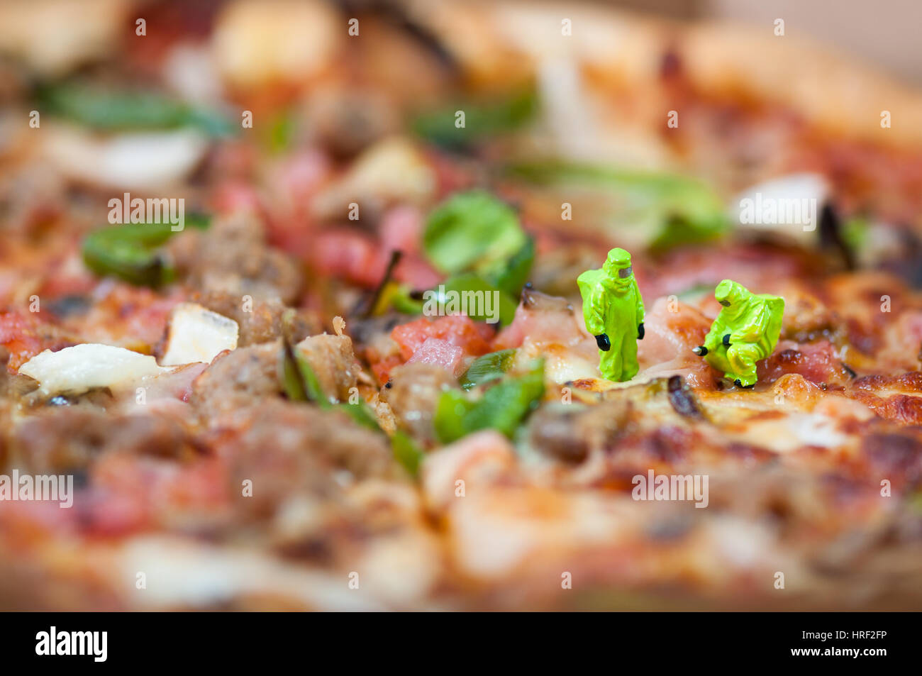 Group of scientists inspecting pizza. Unhealthy food concept Stock ...