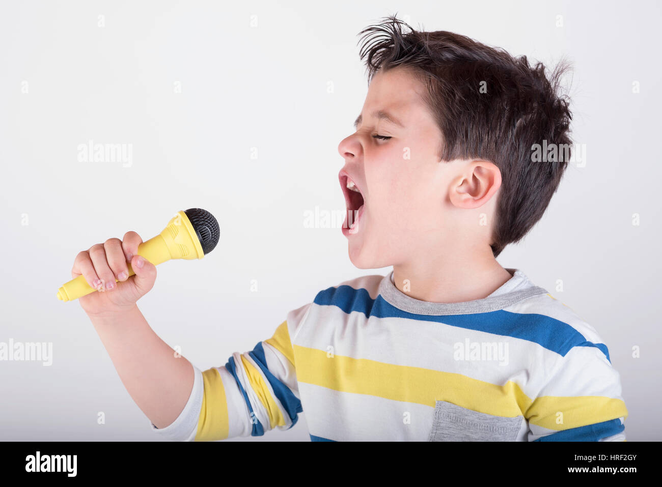 Child singing stage hi-res stock photography and images - Alamy