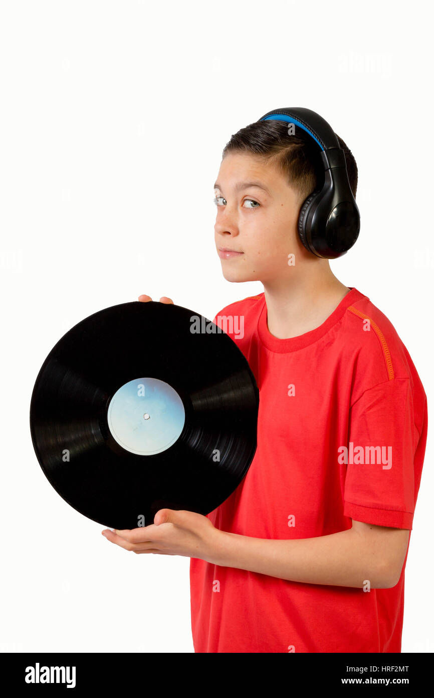Teenage boy holding a LP Stock Photo - Alamy