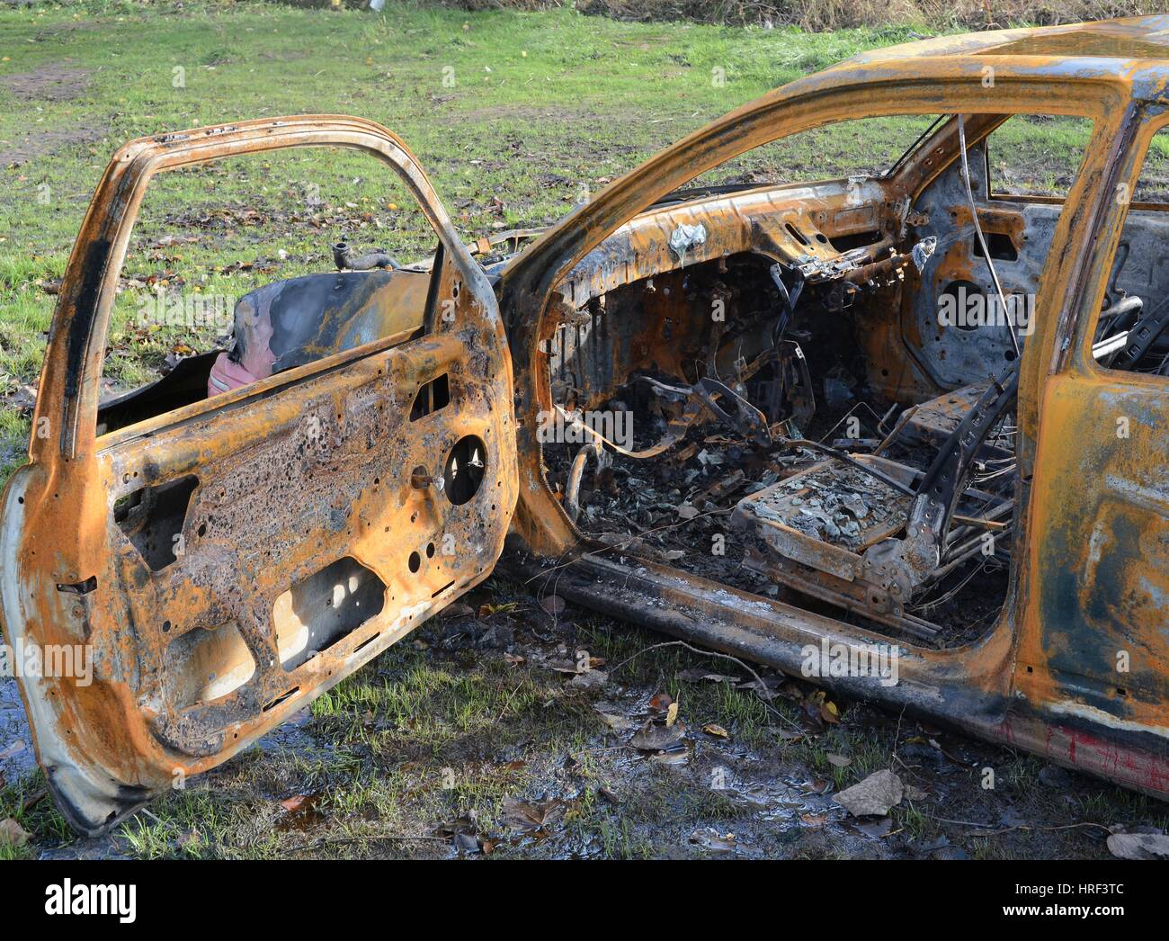 Burned out stolen car Stock Photo - Alamy