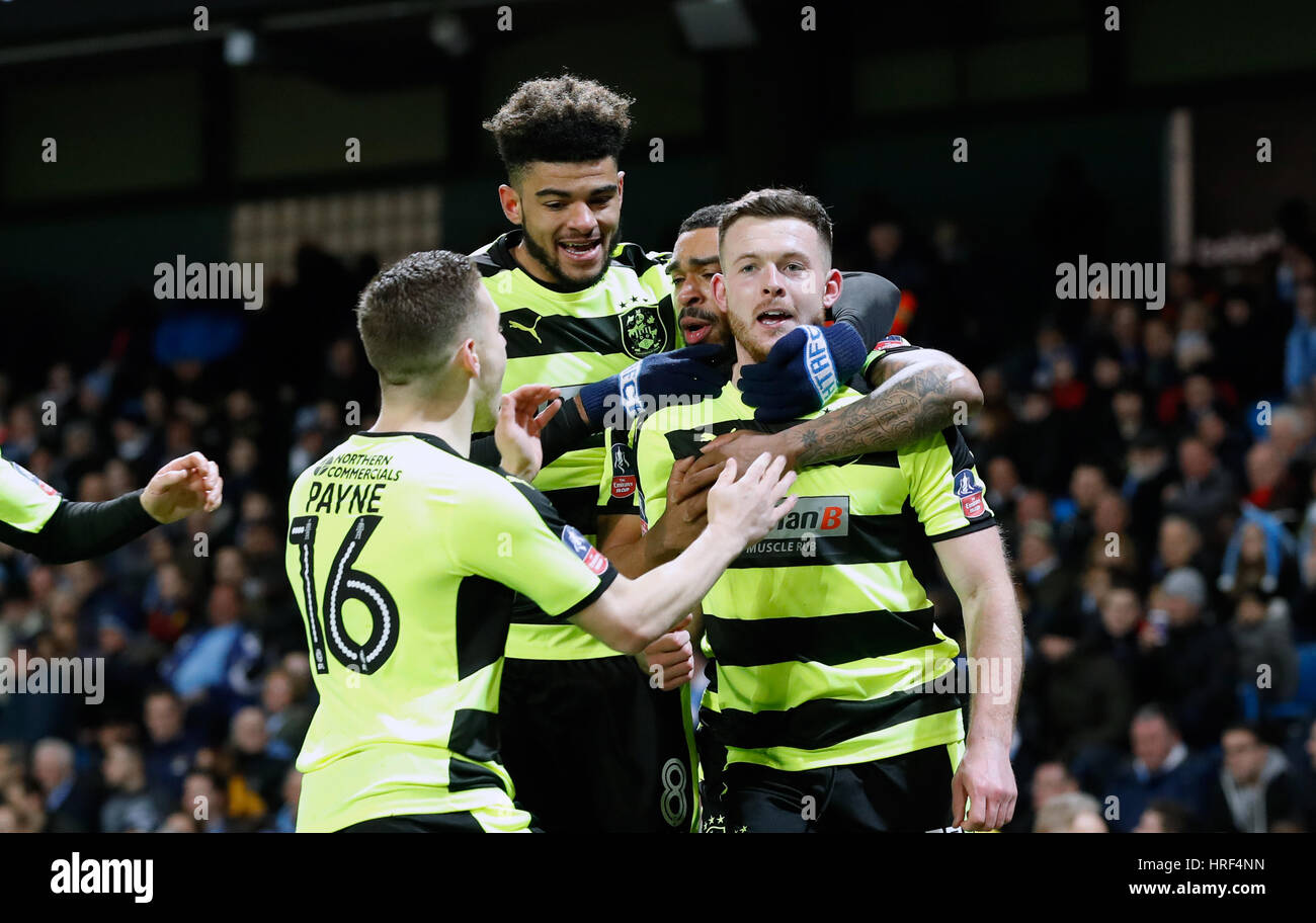 Huddersfield Town's Harry Bunn (right) celebrates scoring his side's ...