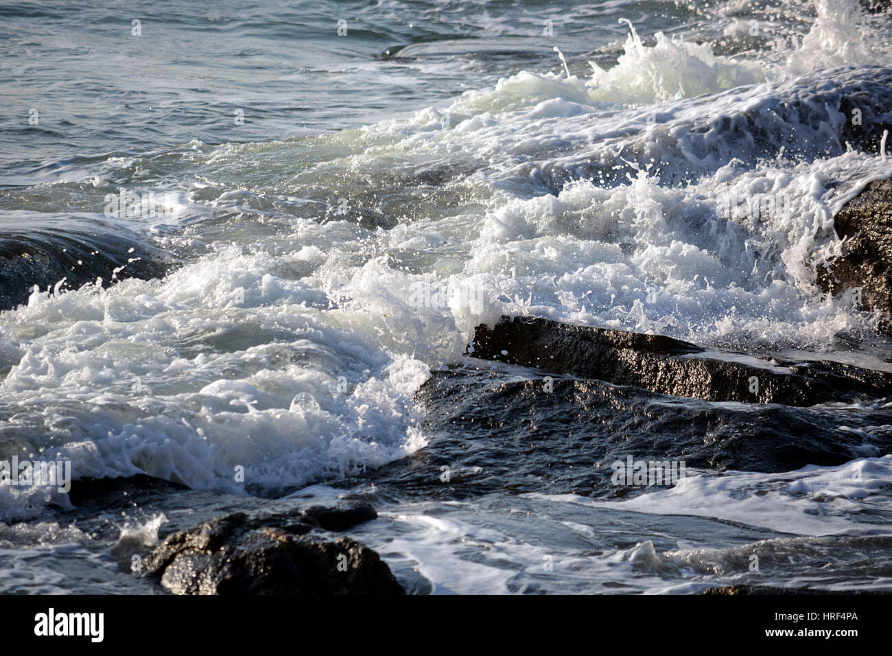 Waves and rocks Stock Photo - Alamy