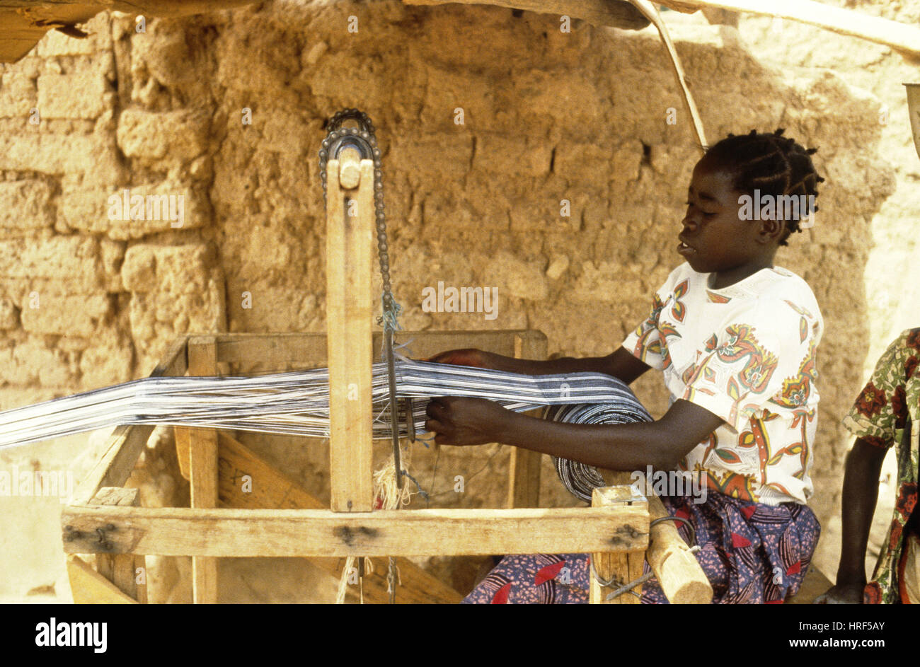 Girl weaving loom hi-res stock photography and images - Alamy