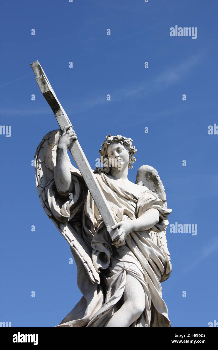Angel with the cross hi-res stock photography and images - Alamy