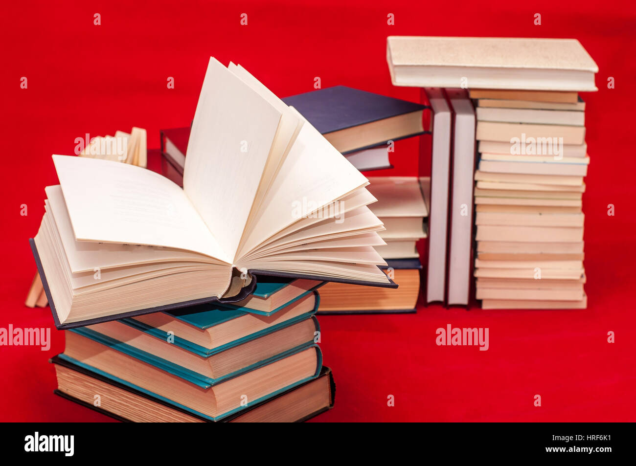 Pile of books open book hi-res stock photography and images - Alamy