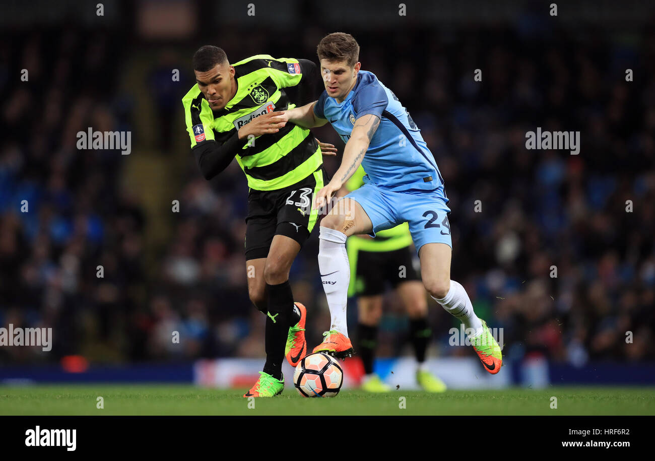 Huddersfield Town's Collin Quaner (left) and Manchester City's John ...