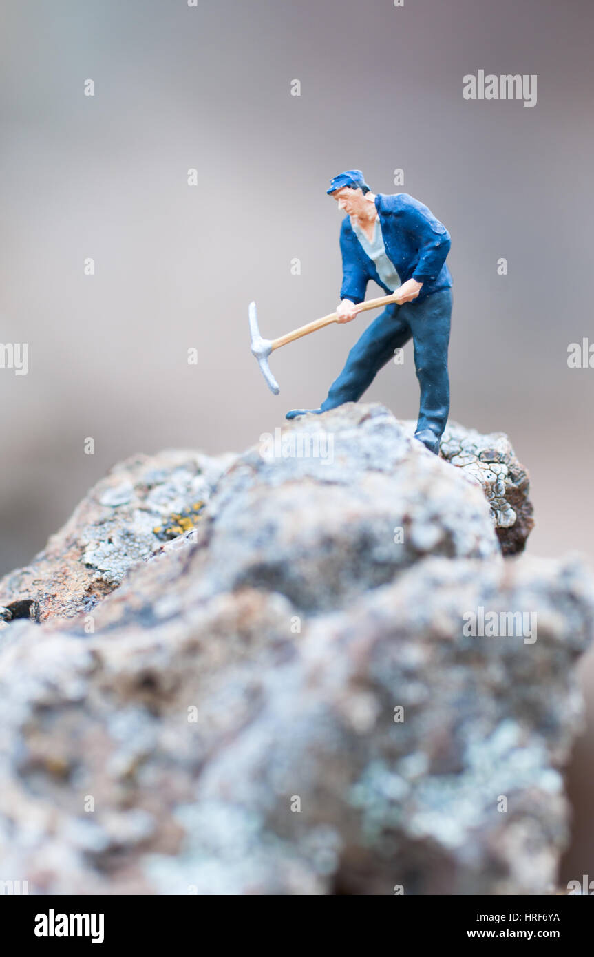 Miner with pickaxe Stock Photo - Alamy