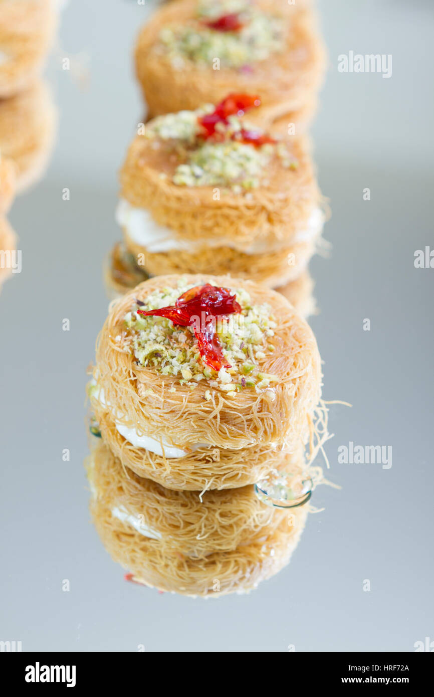 Knafe or Kunafe is a very popular dessert in the levant Lebanon, Syria ...