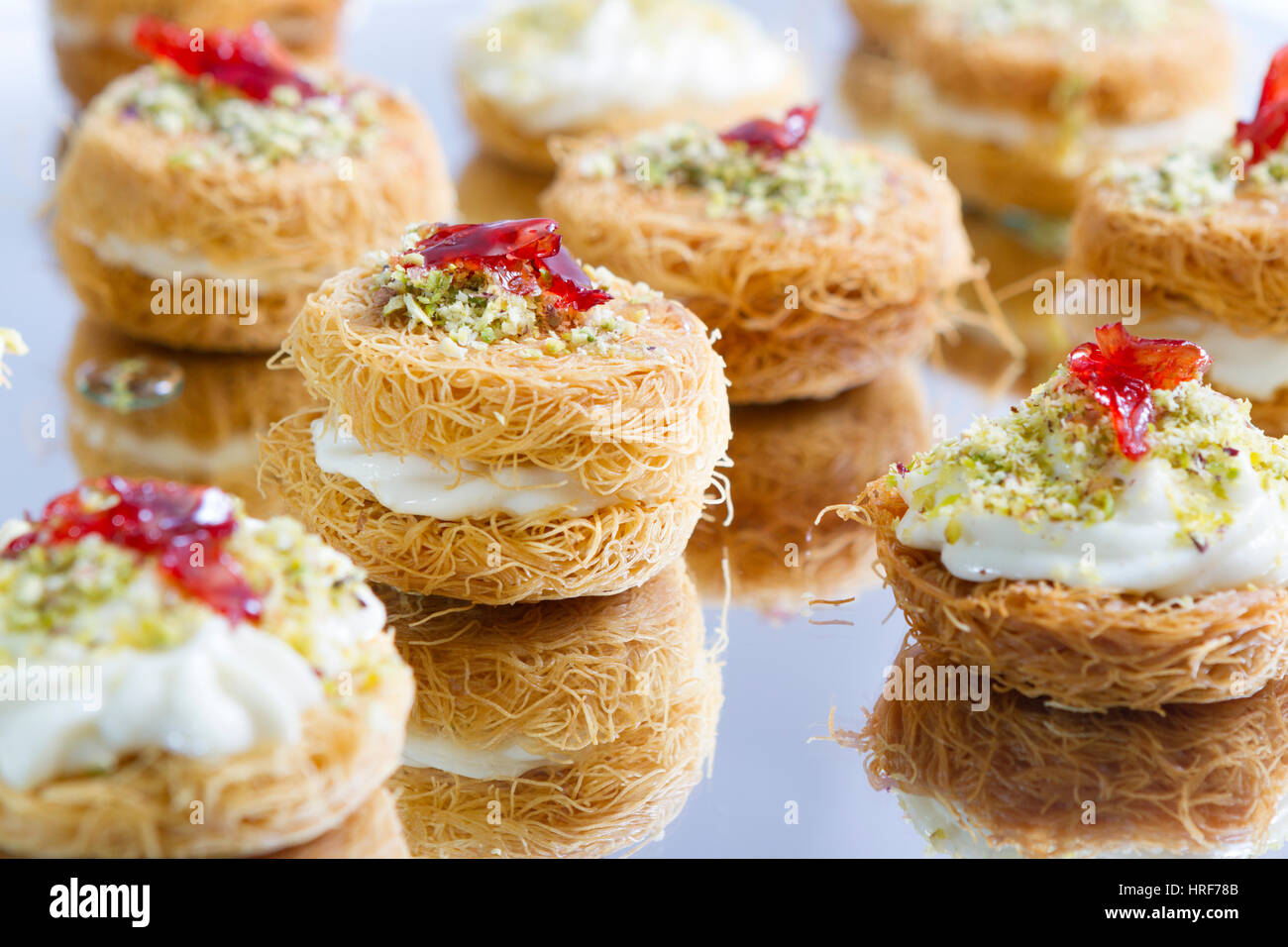 Knafe or Kunafe is a very popular dessert in the levant Lebanon, Syria ...