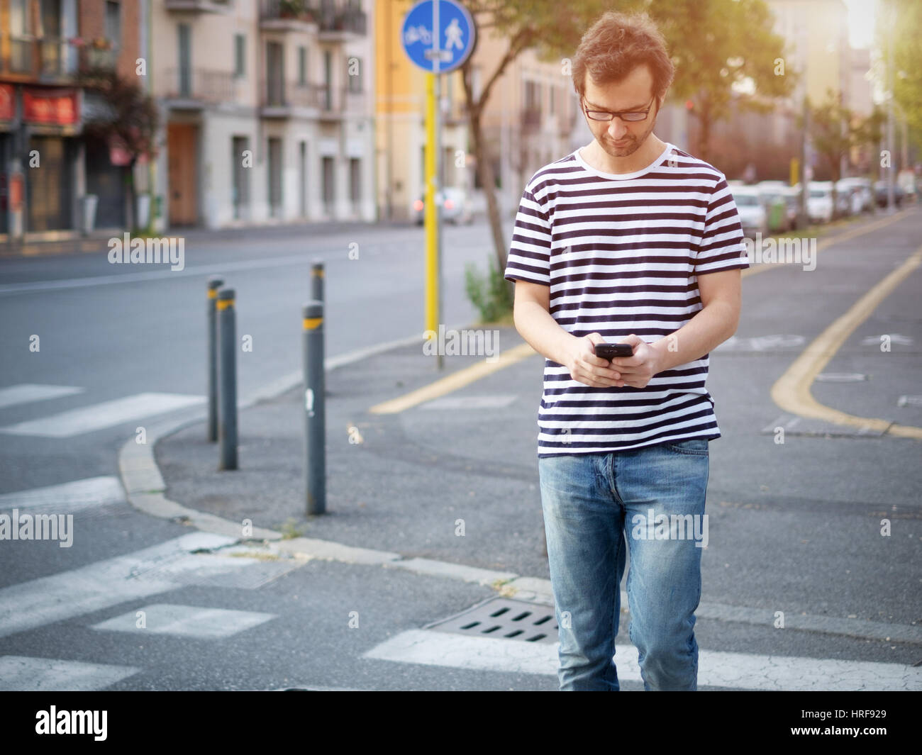 Mobile walking pedestrian crossing hi-res stock photography and images ...