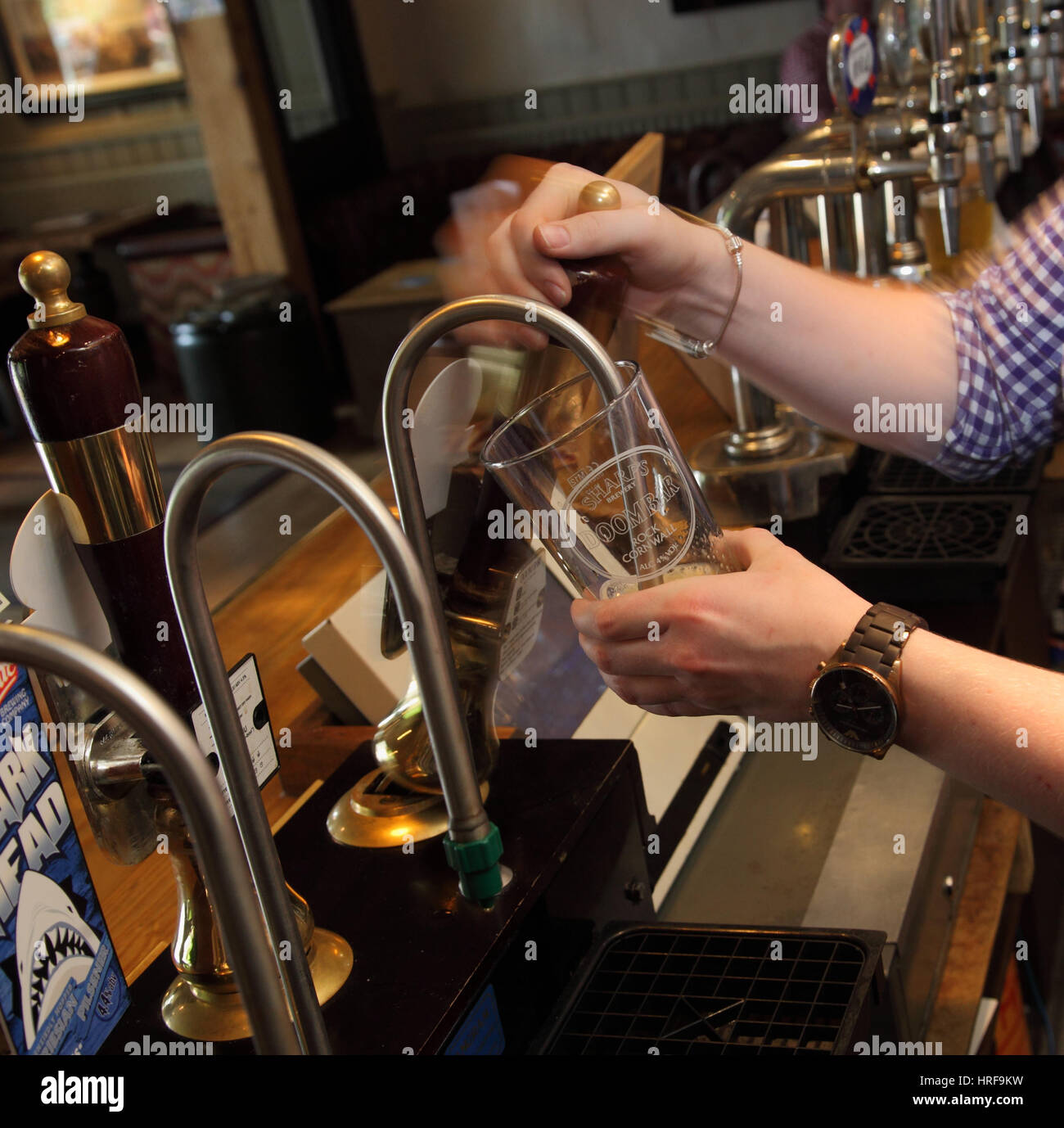 Barmaid pulling a pint hi-res stock photography and images - Alamy