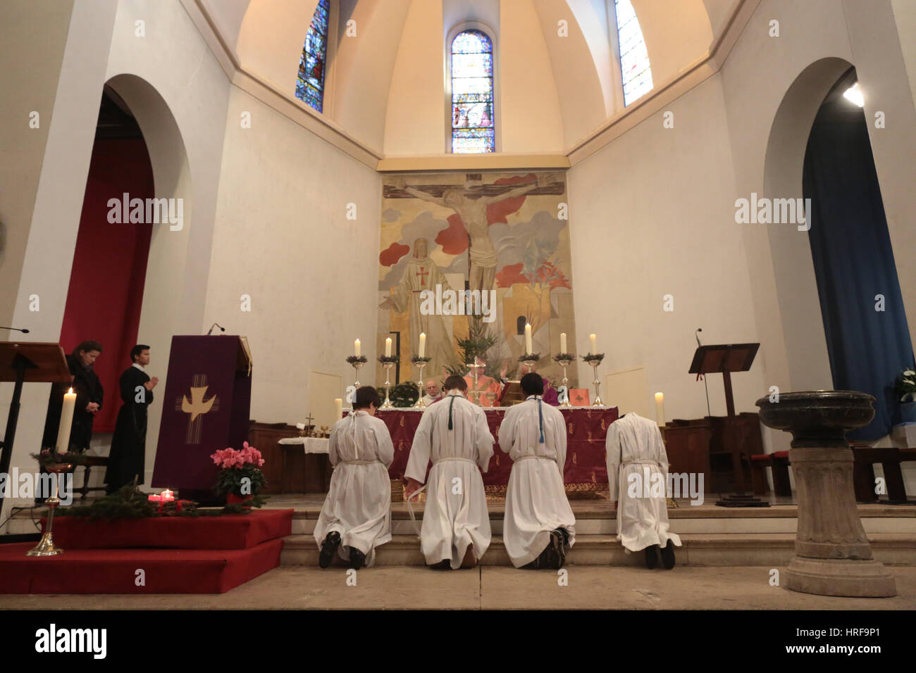 Servants of mass. Sunday mass Stock Photo - Alamy