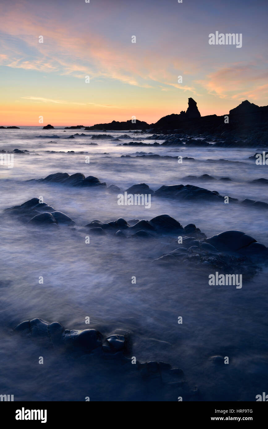 Rocks in the sea, rocky coast in the evening light, Atlantic Coast ...