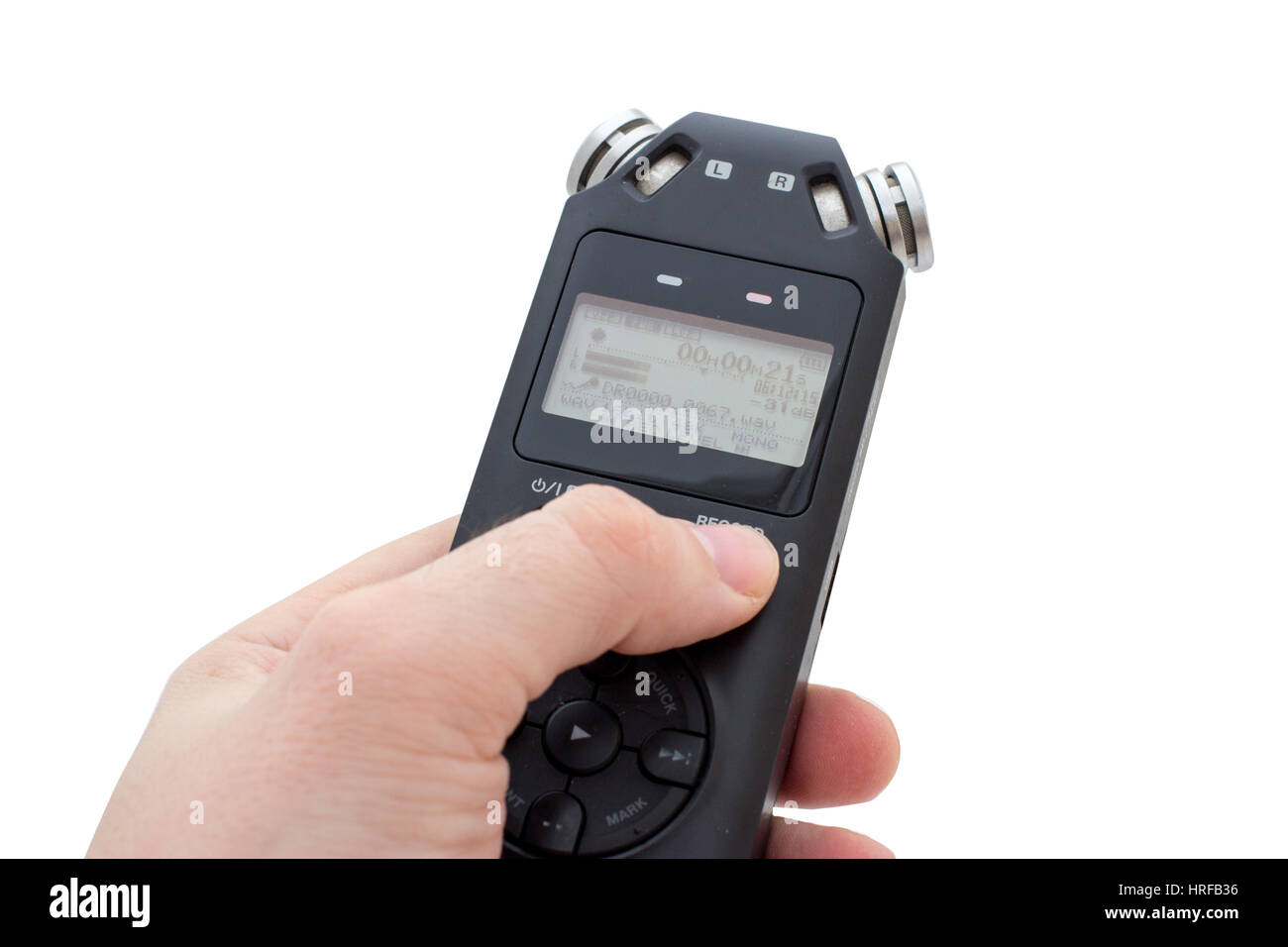Male hand holding Audio Recorder using for documenting sound, isolated ...