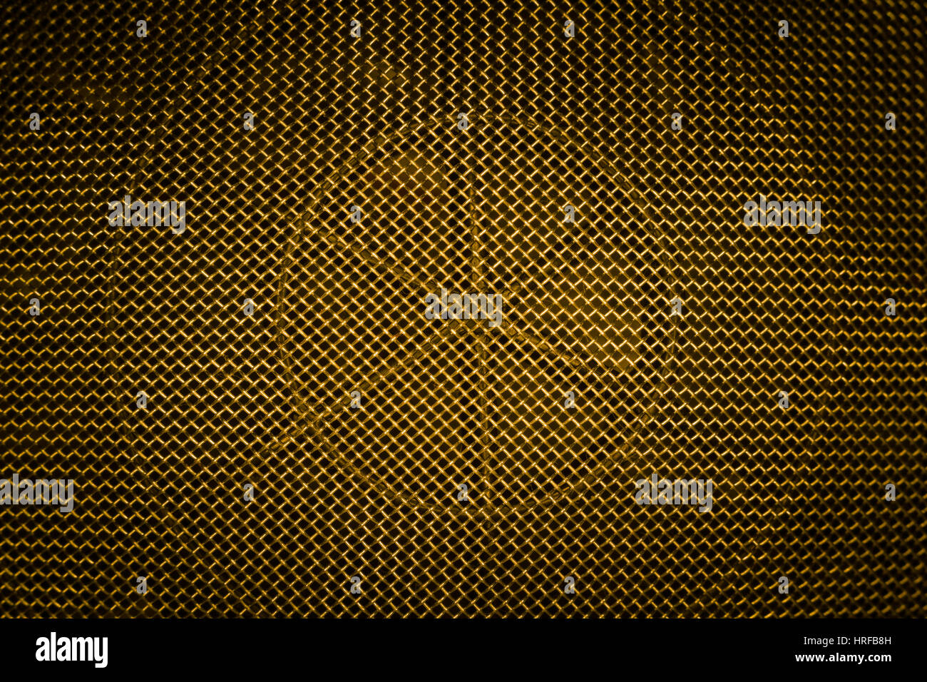Metal net texture, yellow abstract background Stock Photo - Alamy