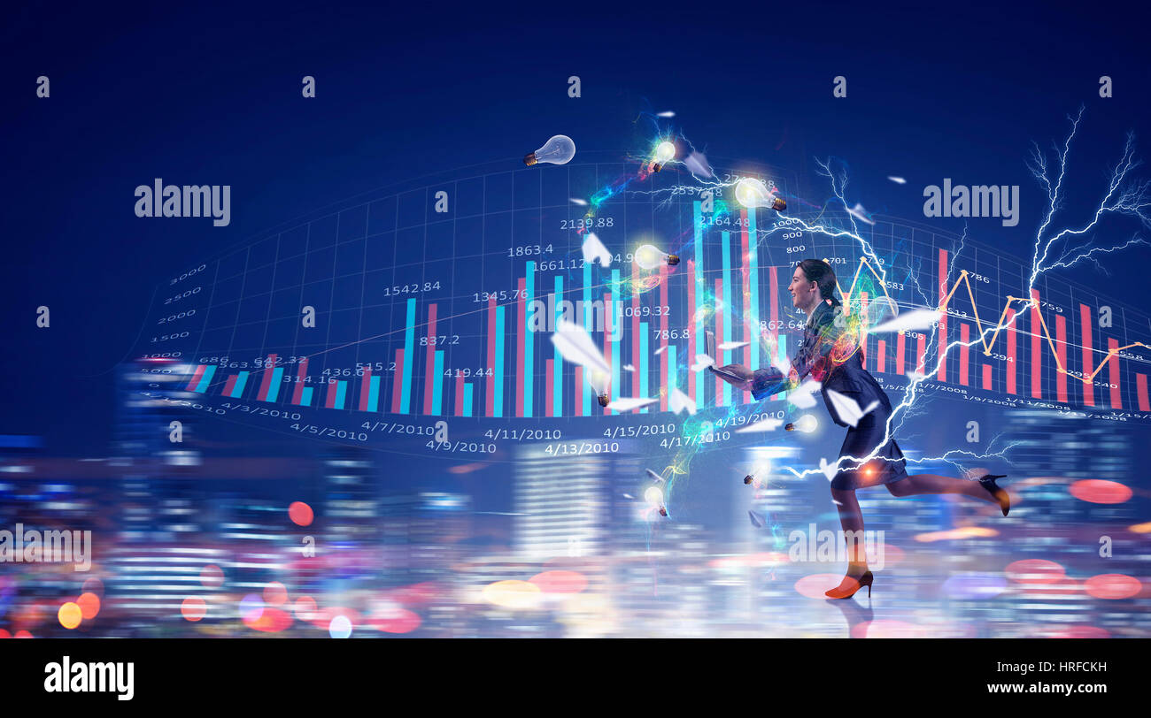 Successful businesswoman running with laptop computer in hands Stock ...